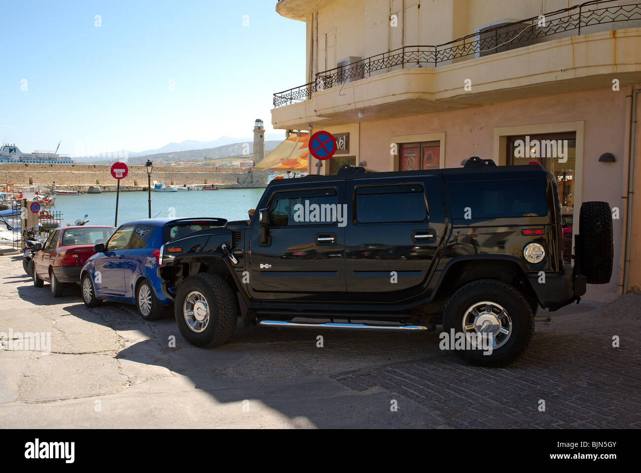 Hummer parked by the harbour in Rethymnon old town Crete Greece Stock ...