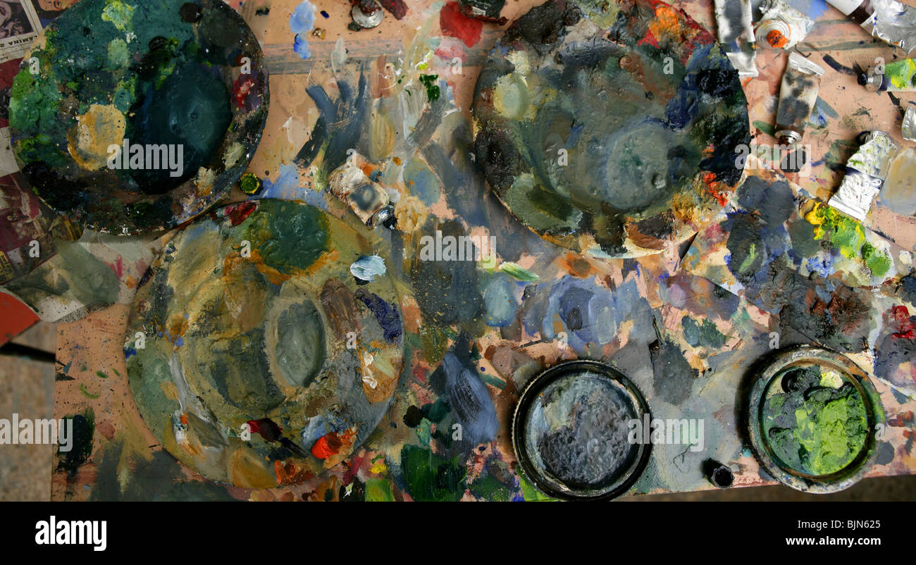 Artist studio painted dirty table, colored in many colors Stock Photo ...