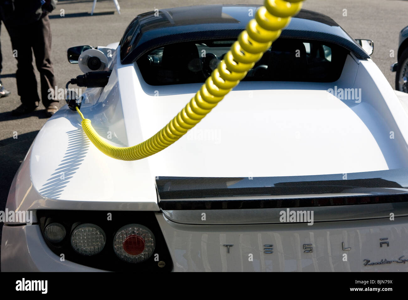 Tesla Roadster recharging its battery Stock Photo - Alamy