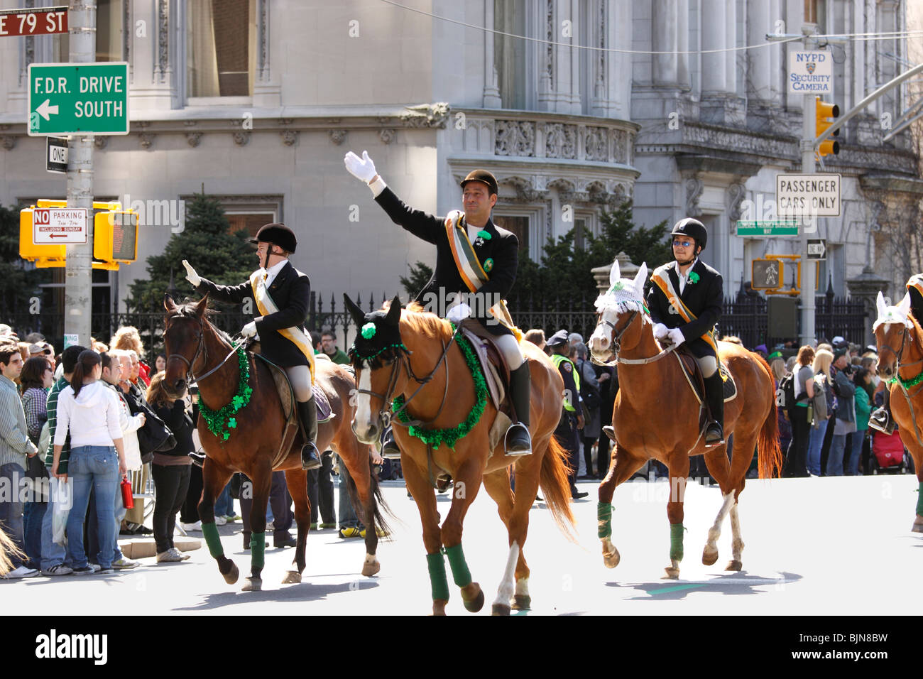 Mounted parade participants parade horses up 5th Ave. in New York City ...