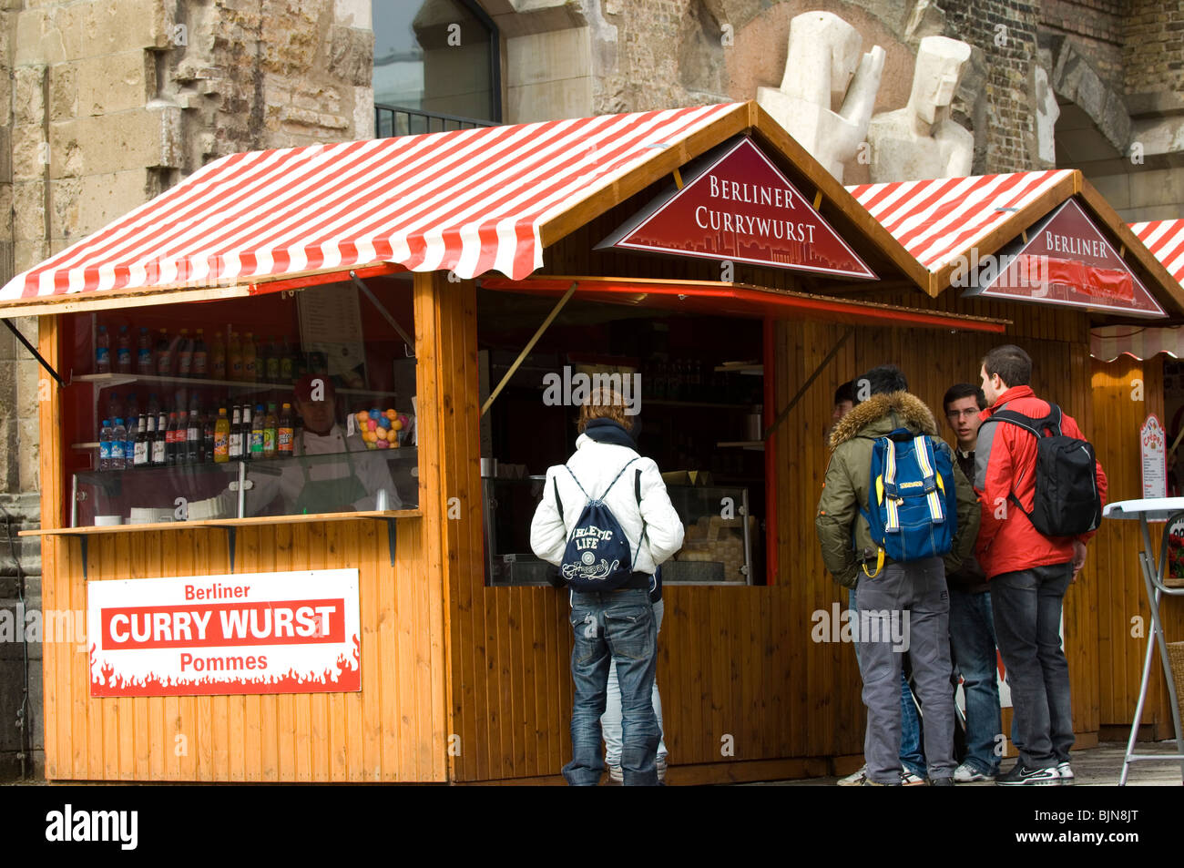 People buying curry outside the Kaiser Wilhelm memorial church Berlin ...