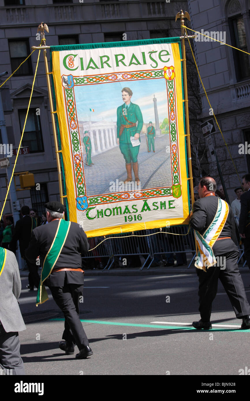 Marchers carrying banner in St. Patrick's Day parade on 5th Avenue in ...