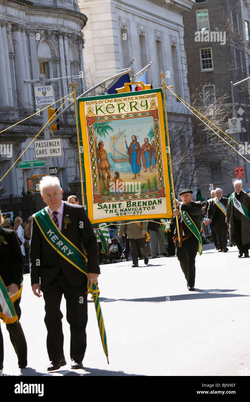 Marchers carrying banner in St. Patrick's Day parade on 5th Avenue in ...