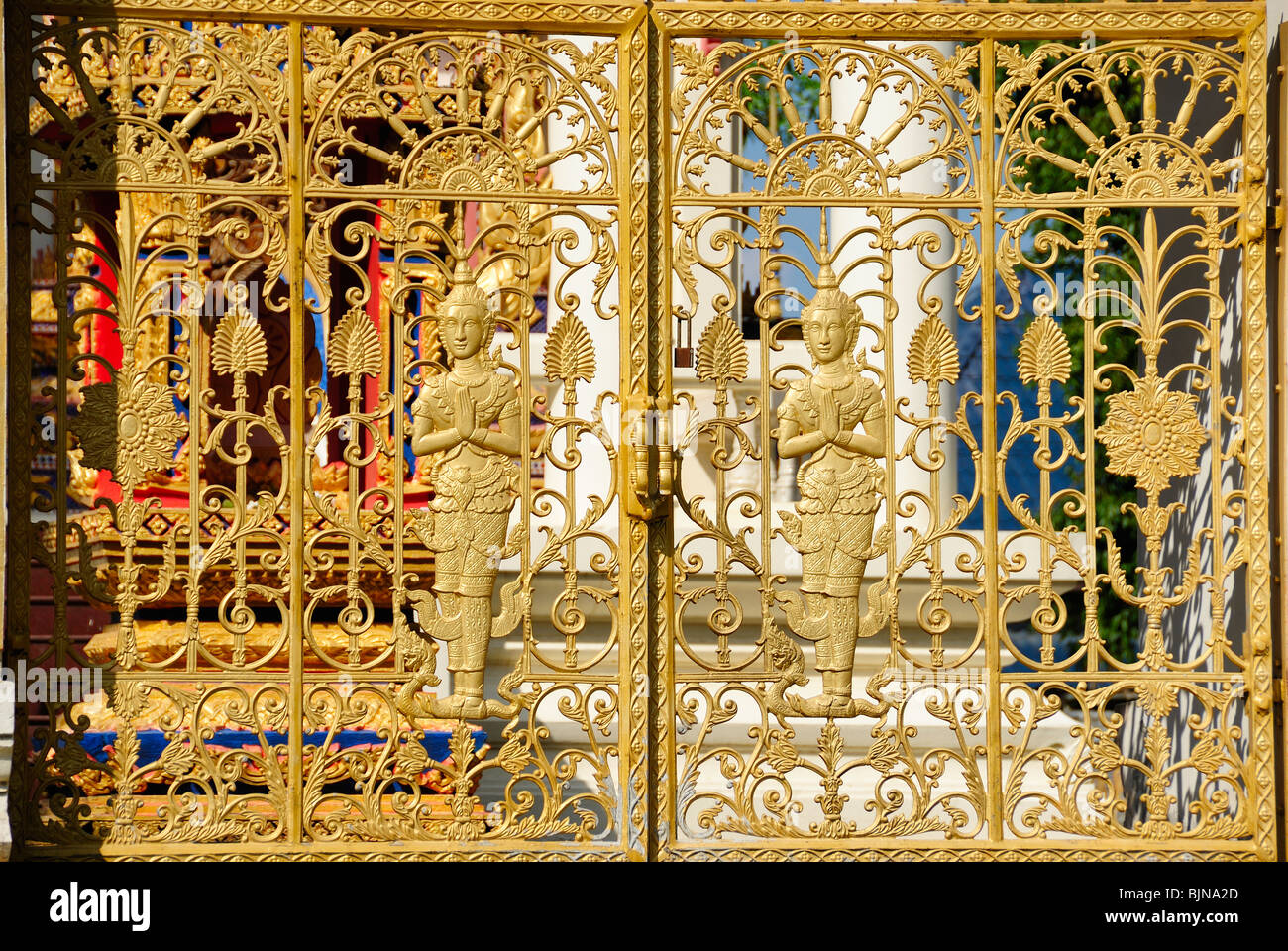 Painted iron gate of a Buddhist temple in Thailand Stock Photo - Alamy