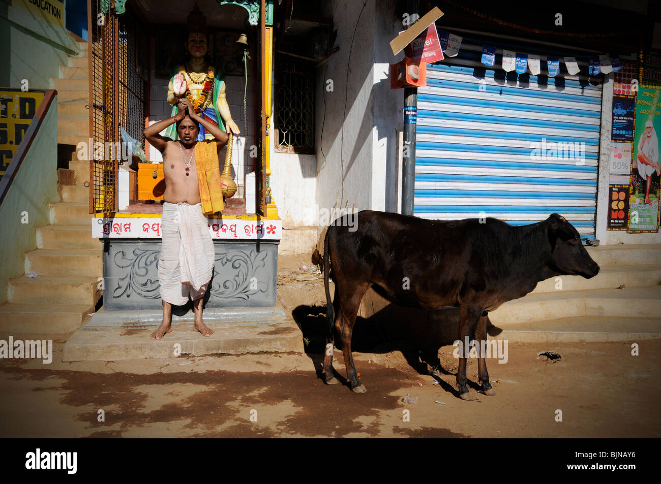 Priest performing morning devotions Stock Photo - Alamy