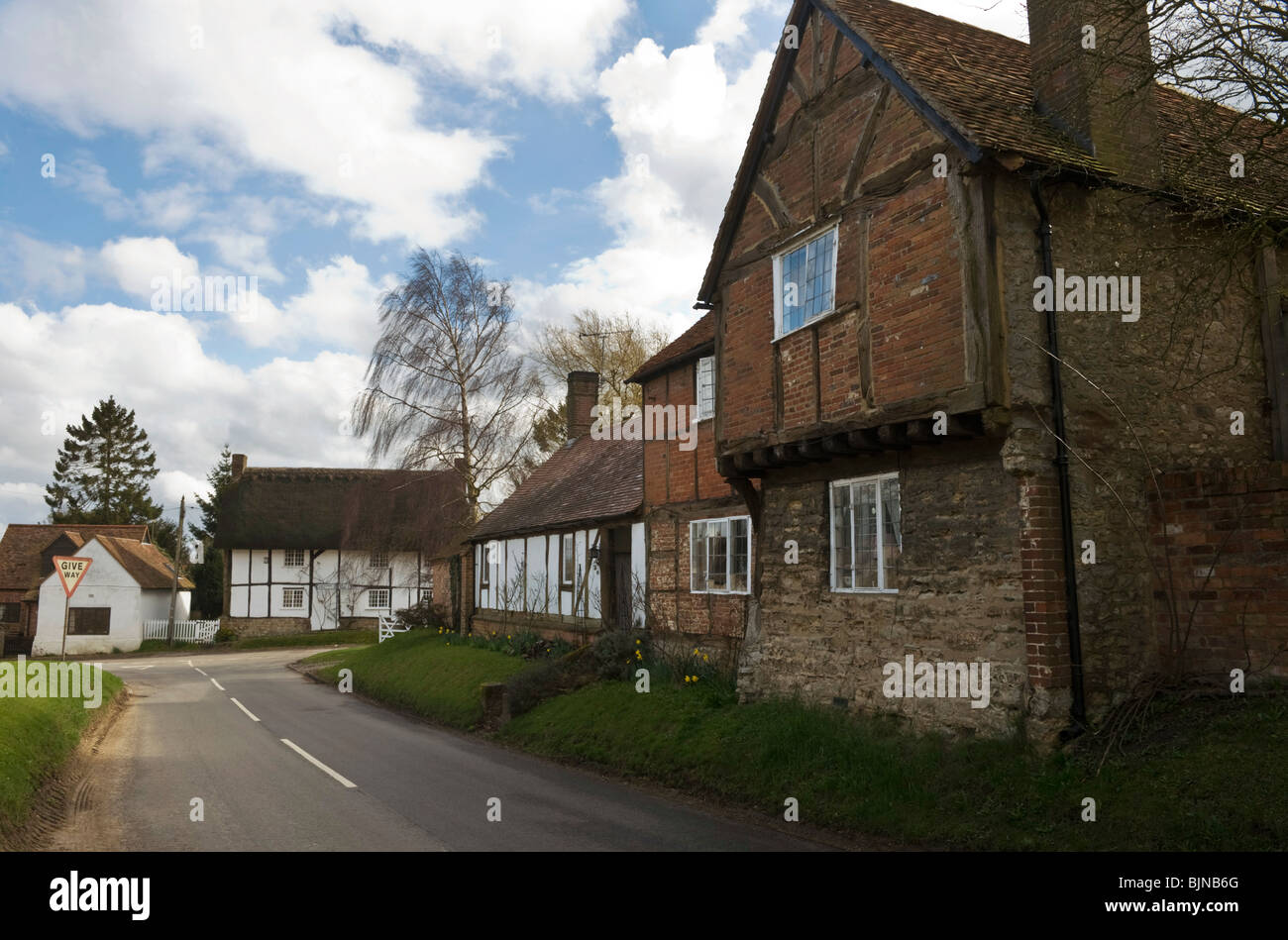 A quiet country road in the rural village of Chilton in Oxfordshire UK ...