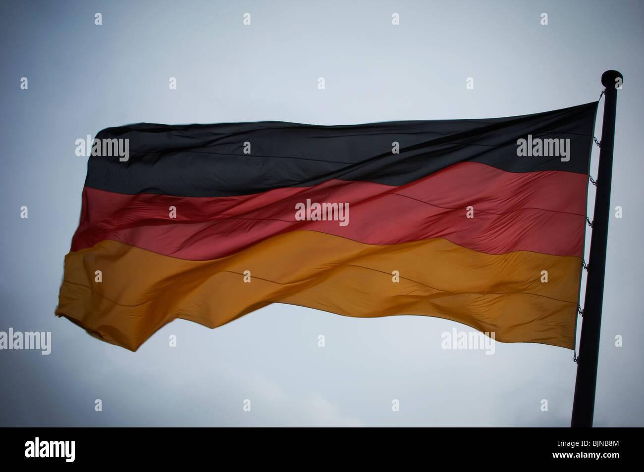 The German flag flying in the air Berlin Germany Europe Stock Photo - Alamy