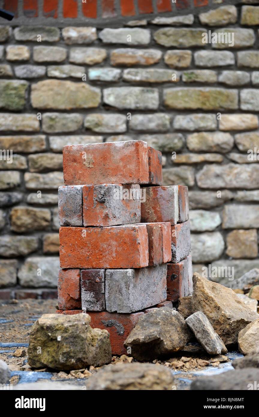 Reclaimed building materials including red bricks used to build a ...