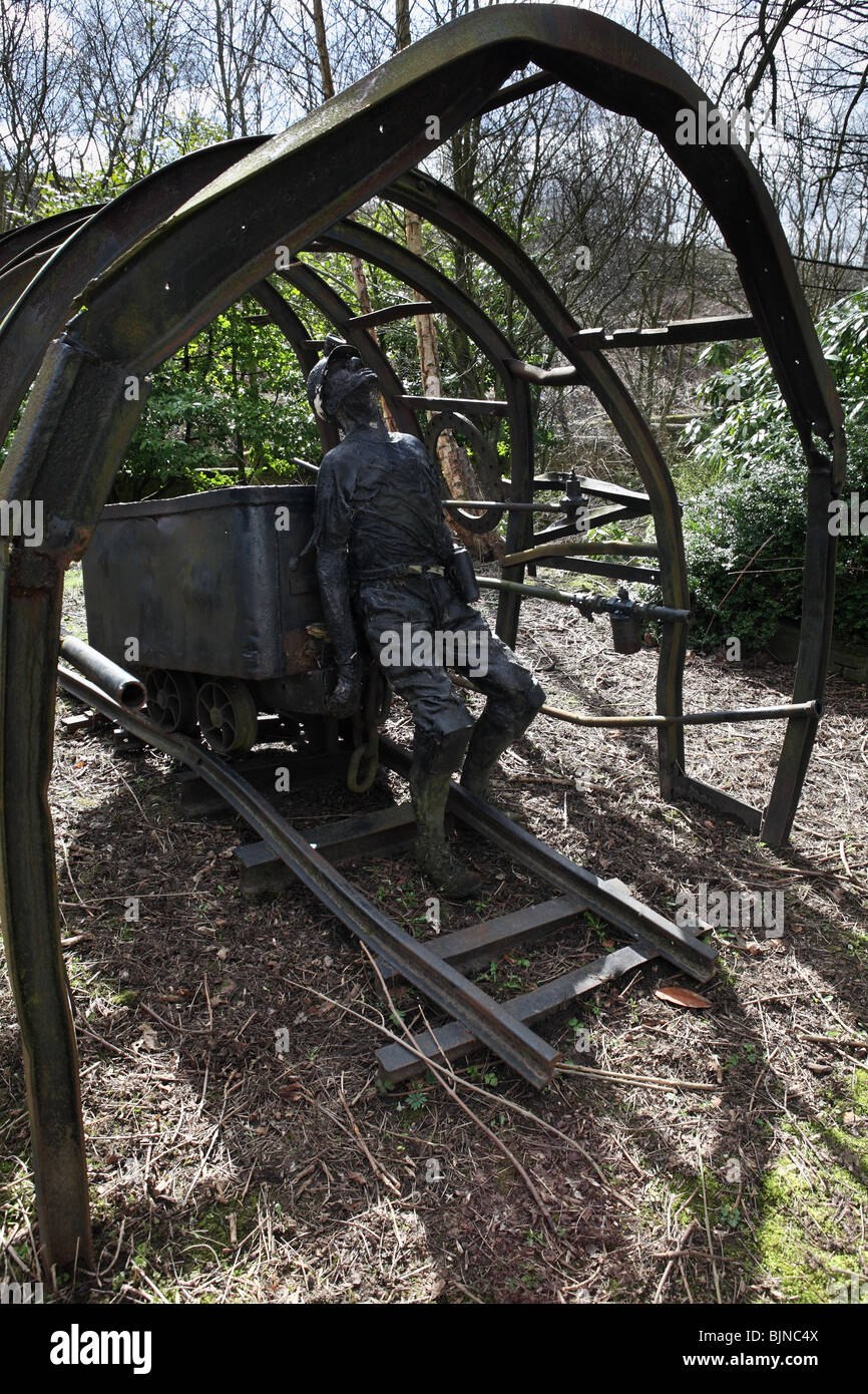 "The Putter" a sculpture of a young coal miner re-railing a full tub ...