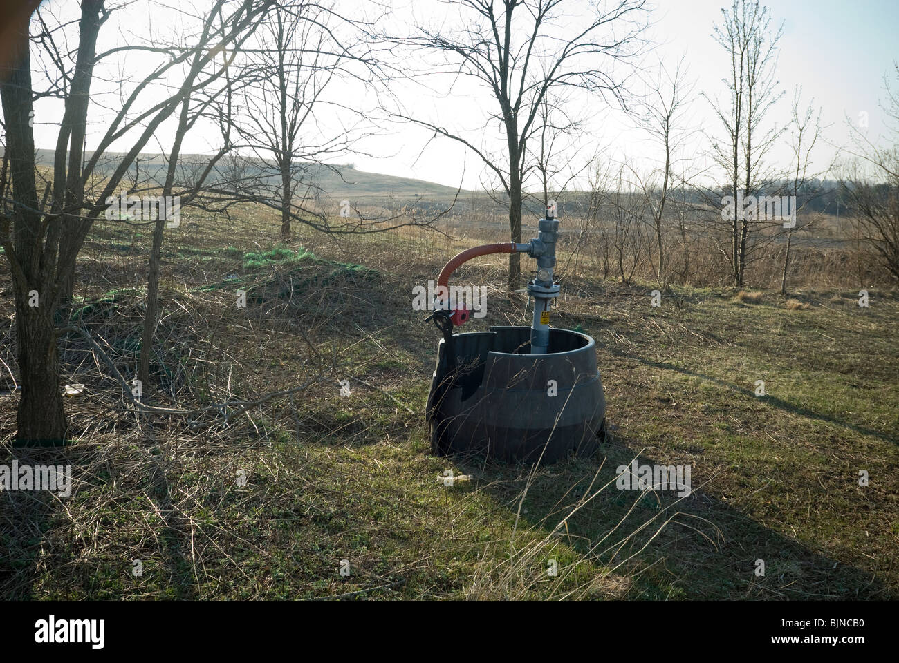 An active methane gas collection wellhead on Little South Mound in the ...