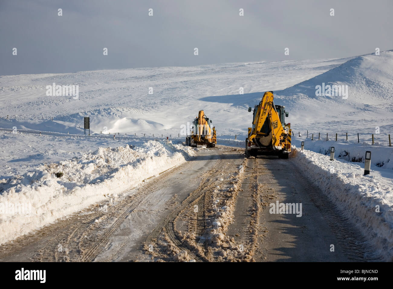 Snow Ploughs working to clear the A640 Rochdale Road at Saddleworth ...