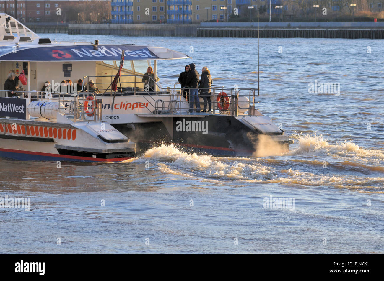 Thames clipper riverboat at Canary Wharf pier jetty , London E14 ...