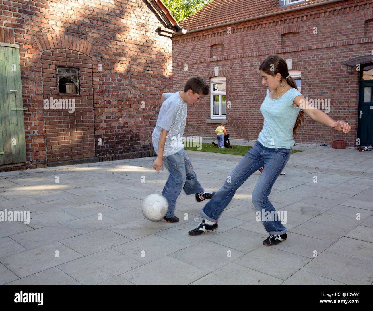 Two teenagers playing football hi-res stock photography and images - Alamy