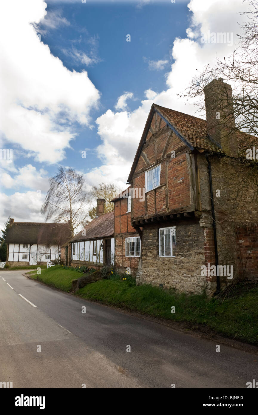 A quiet country road in the rural village of Chilton in Oxfordshire UK ...
