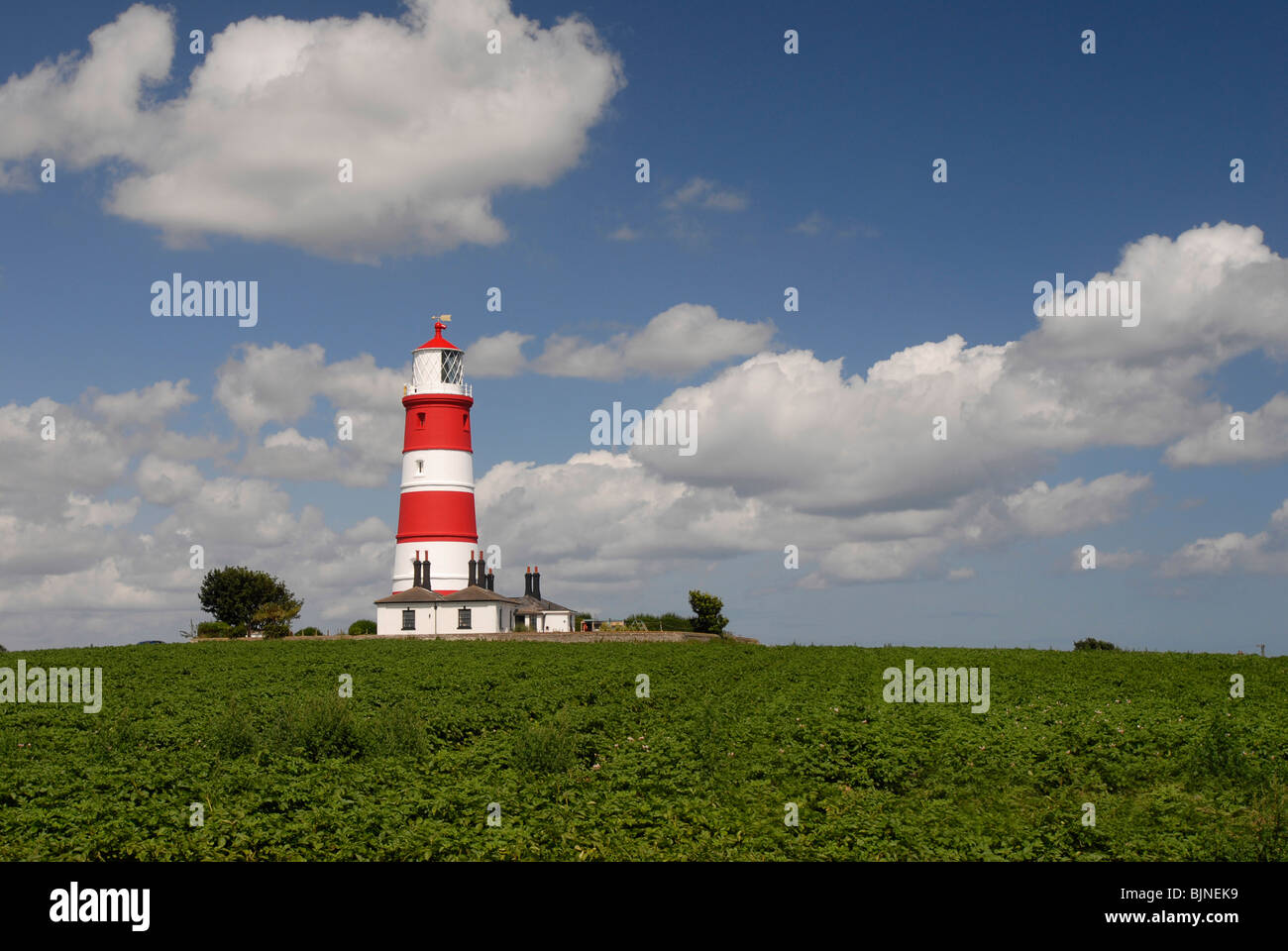 Happisburgh lighthouse on the North Norfolk coast, built in 1790, is ...