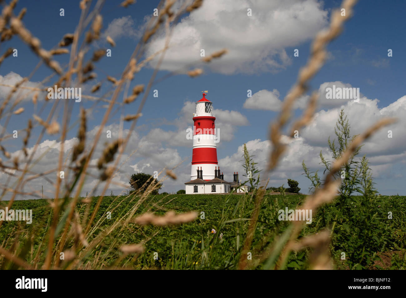 Happisburgh lighthouse on the North Norfolk coast, built in 1790, is ...