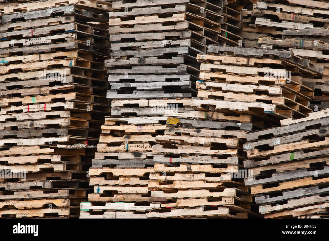 Pallets stacked for recycling, Michigan, USA. Photography by Jeffrey ...