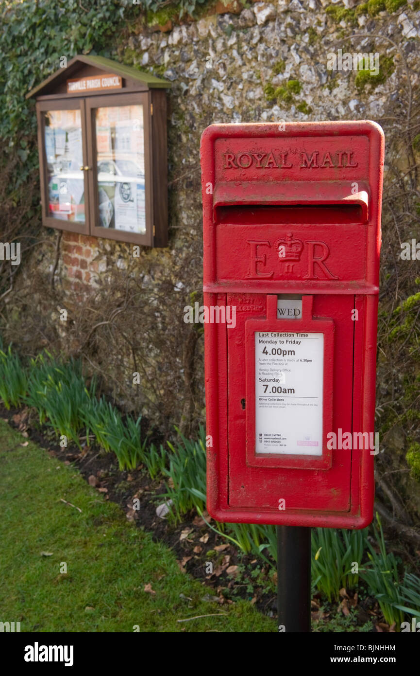 Royal Mail red letter box and village notice board in Turville ...