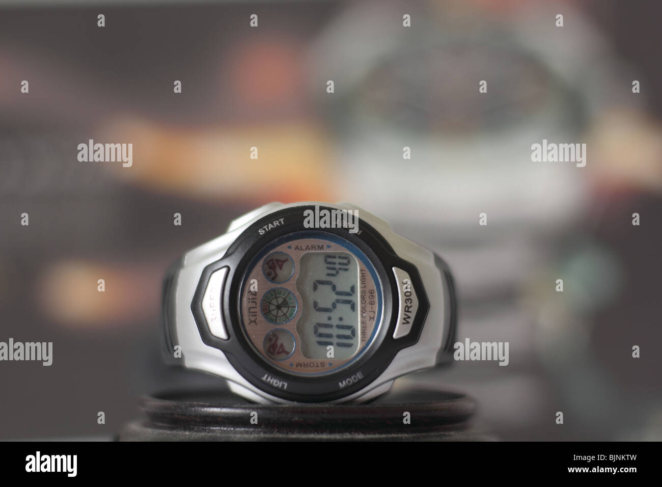 cheap asian plastic digital watch Stock Photo - Alamy