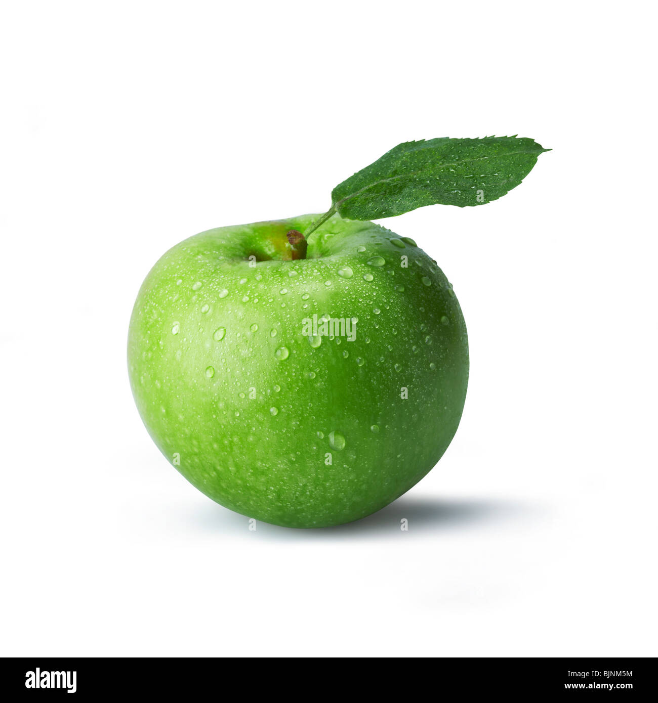 Fresh green apple with drops. The file includes a clipping path ...
