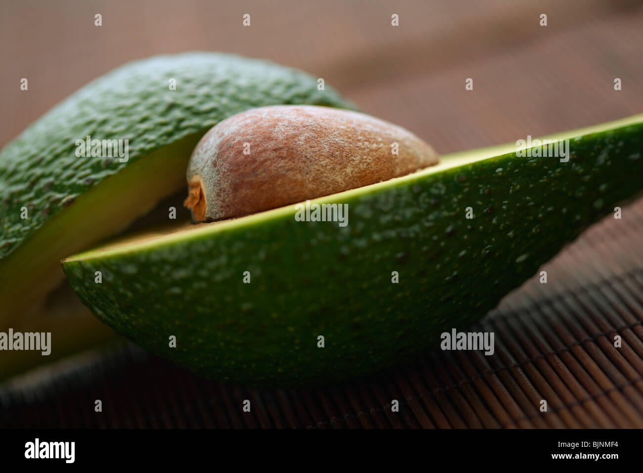 Close-up avocado sliced in half Stock Photo - Alamy