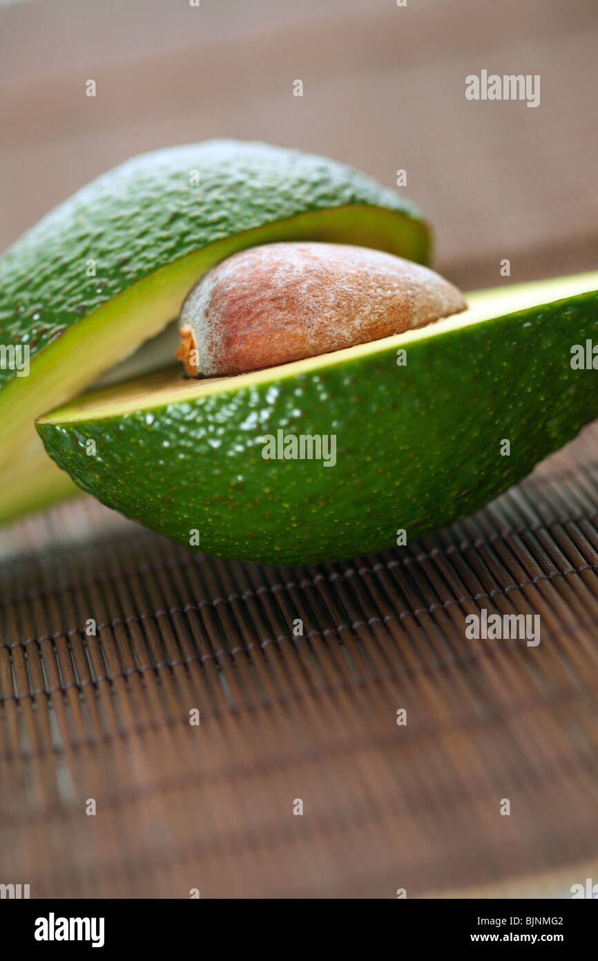 Close-up avocado sliced in half Stock Photo - Alamy