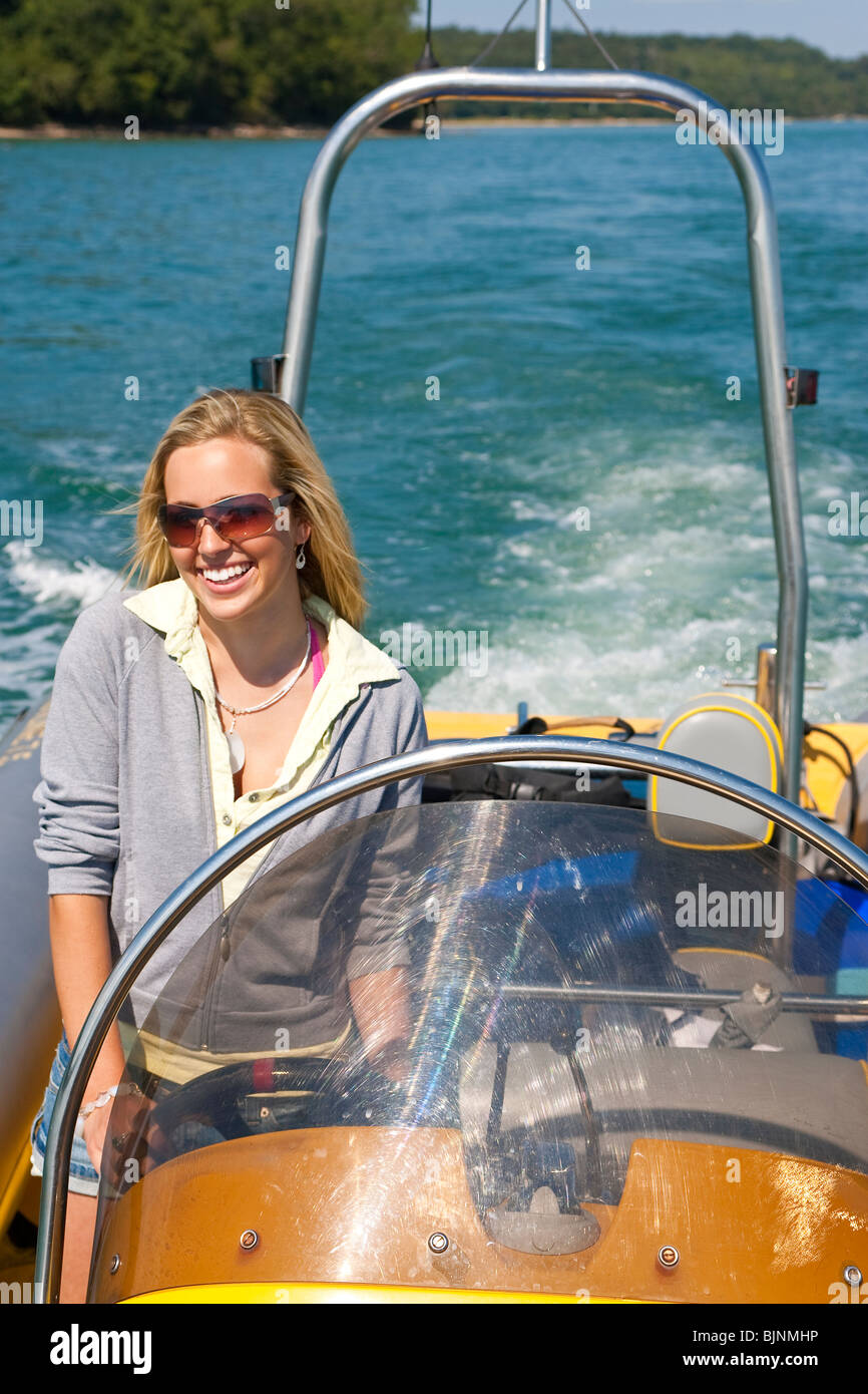 Girl driving speedboat hi-res stock photography and images - Alamy