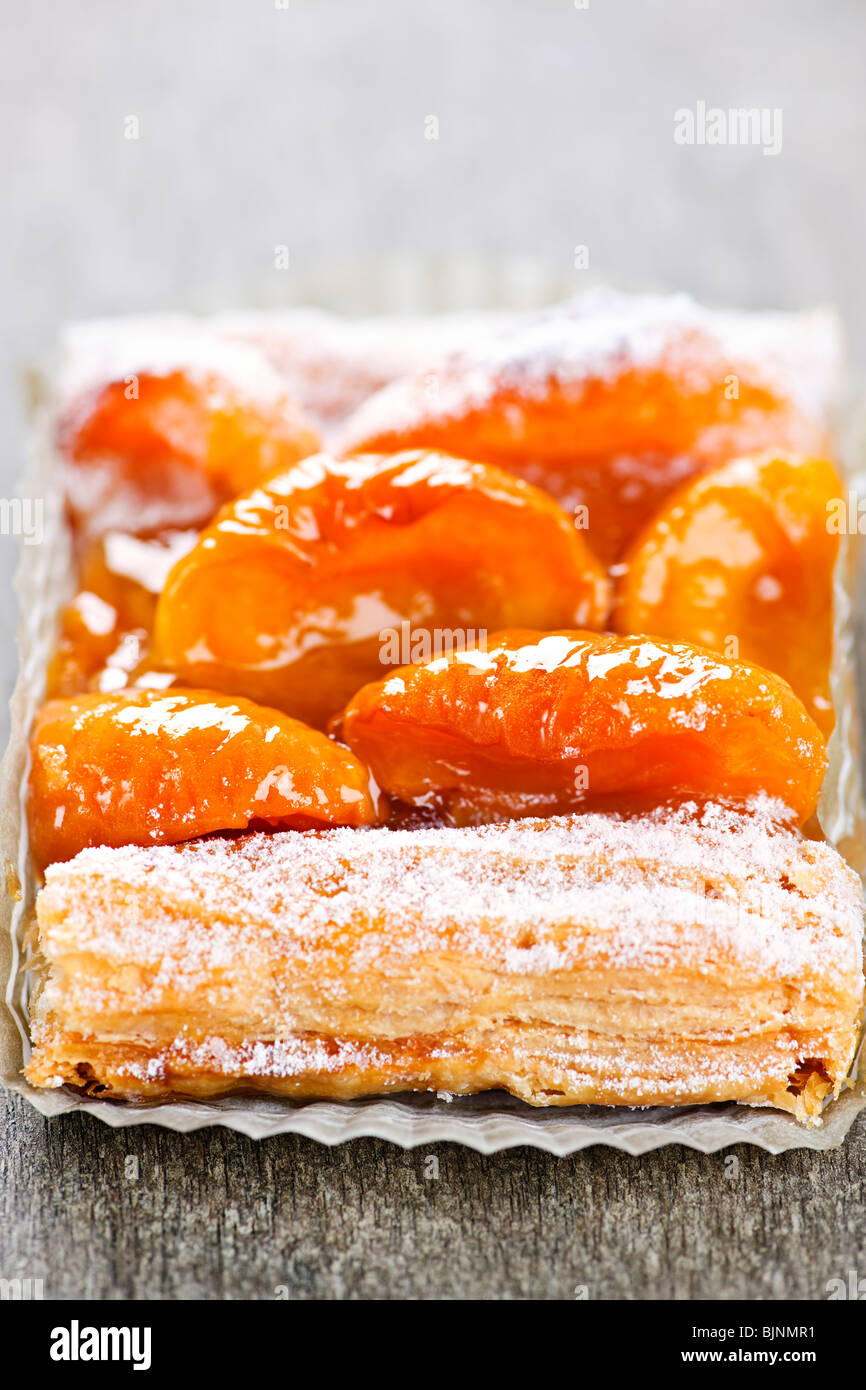 Closeup on slice of flaky apricot strudel pastry dessert Stock Photo ...
