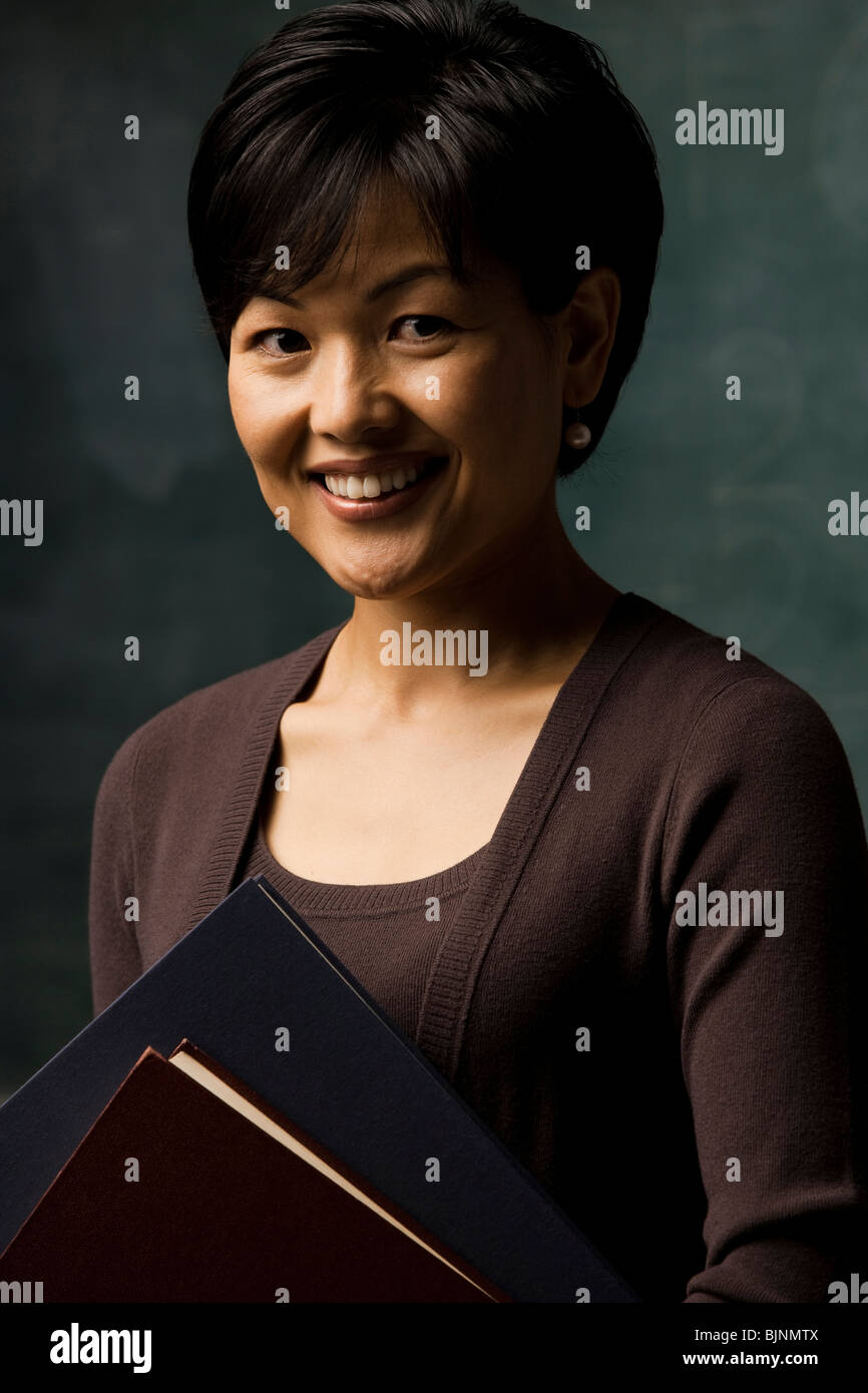 Portrait of smiling woman Stock Photo - Alamy