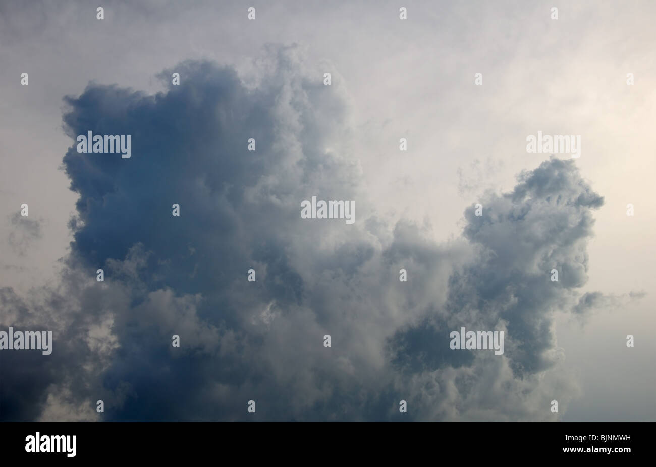 The huge and depressing lowering clouds fill the sky Stock Photo - Alamy