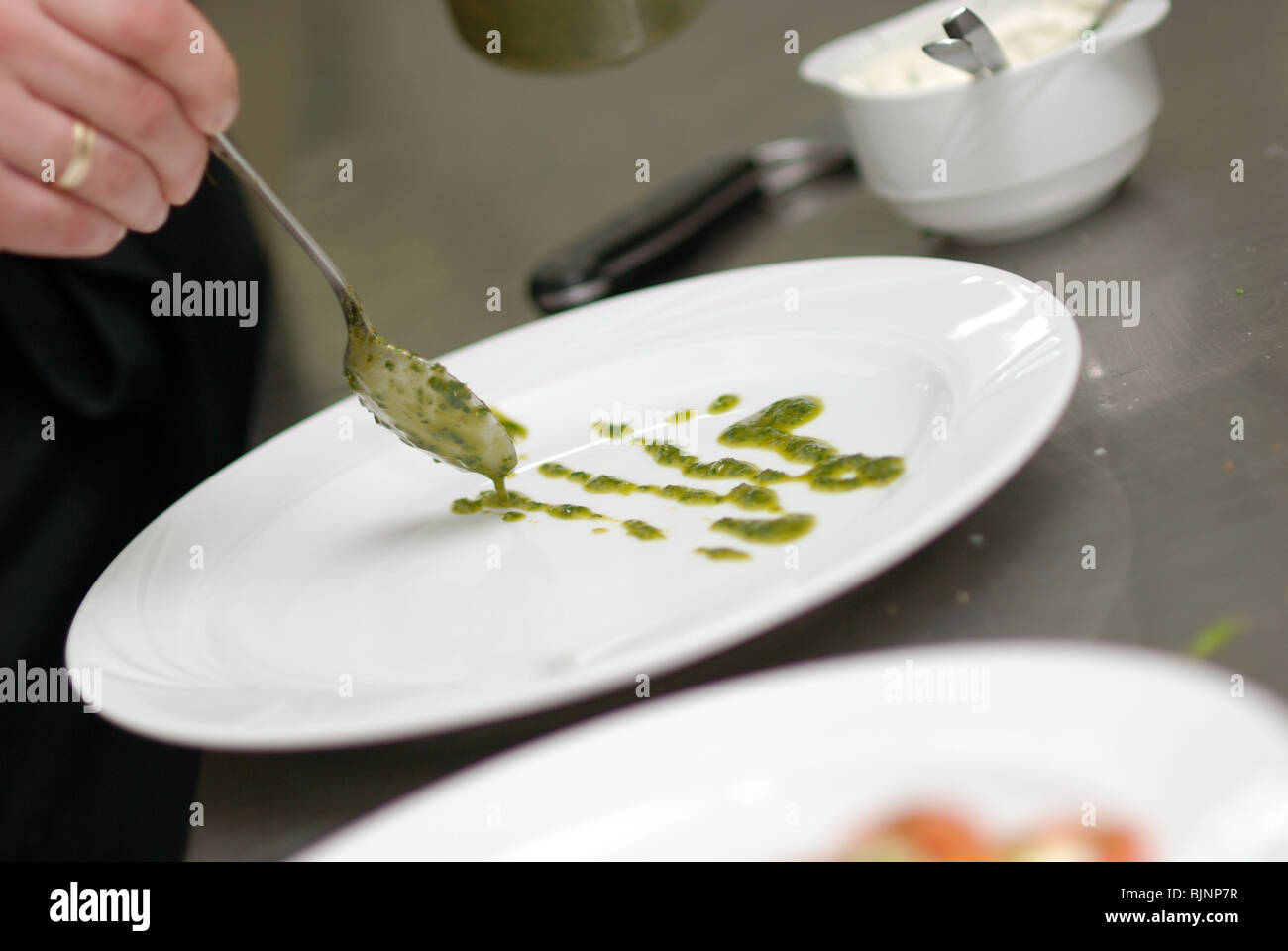 Food decoration in a restaurant kitchen Stock Photo - Alamy