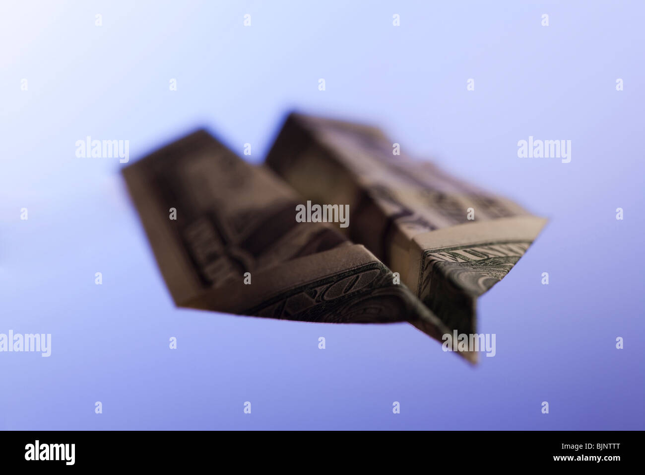 Flying currencies hi-res stock photography and images - Alamy