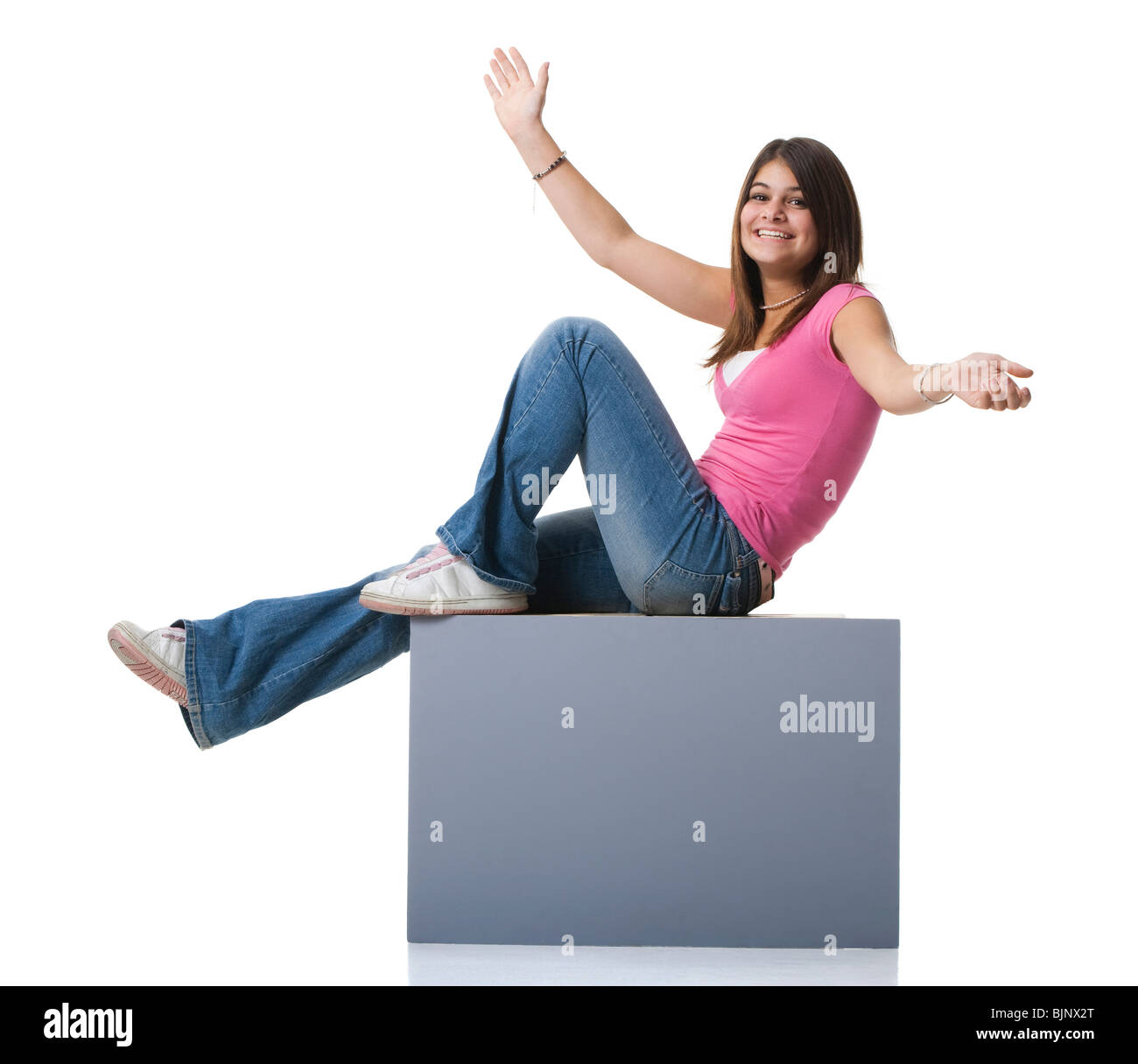 Woman sitting on a blank sign Stock Photo - Alamy