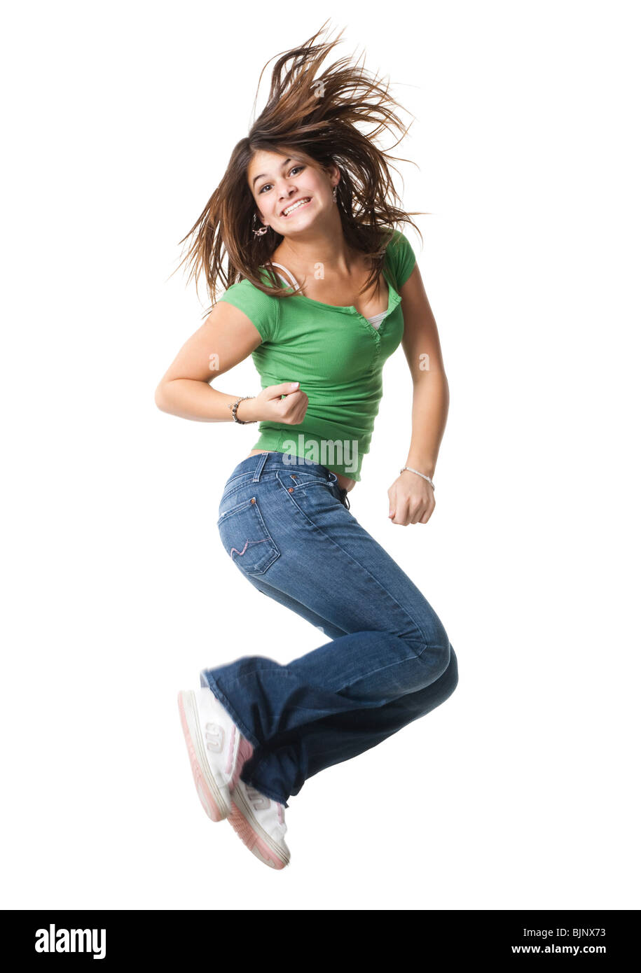 Girl jumping and laughing Stock Photo - Alamy