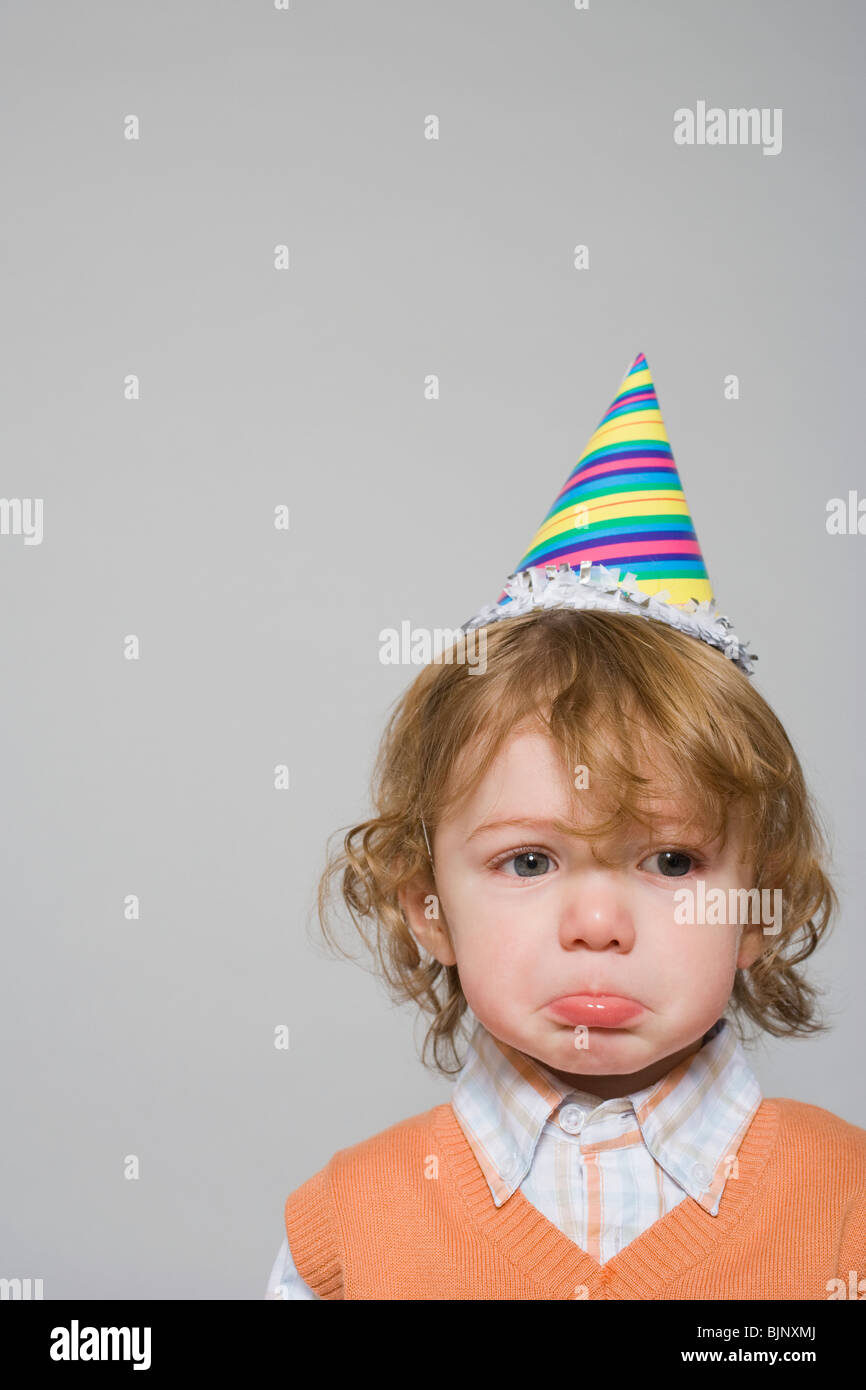 Sad baby party hat hi-res stock photography and images - Alamy