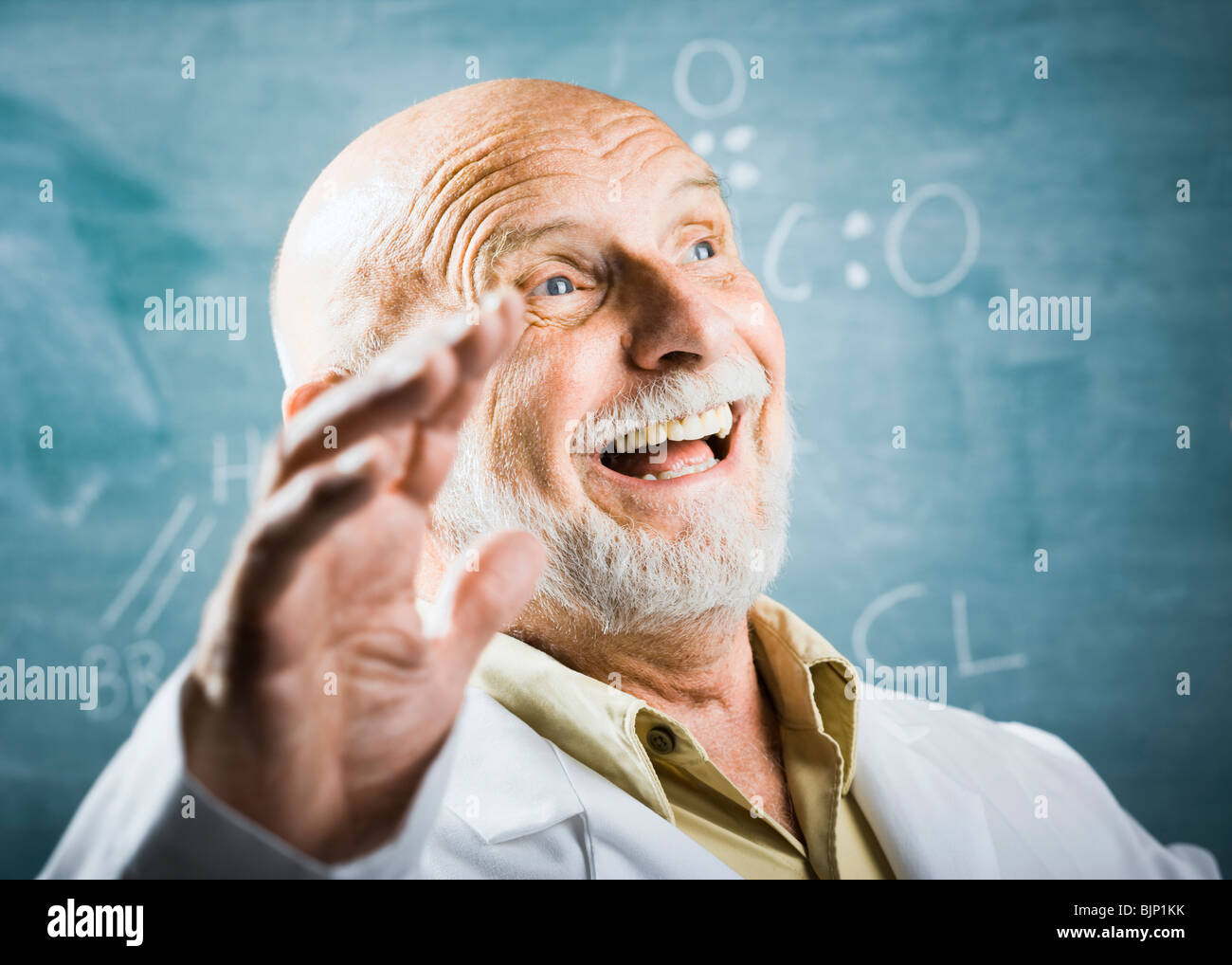 Male science teacher talking Stock Photo - Alamy