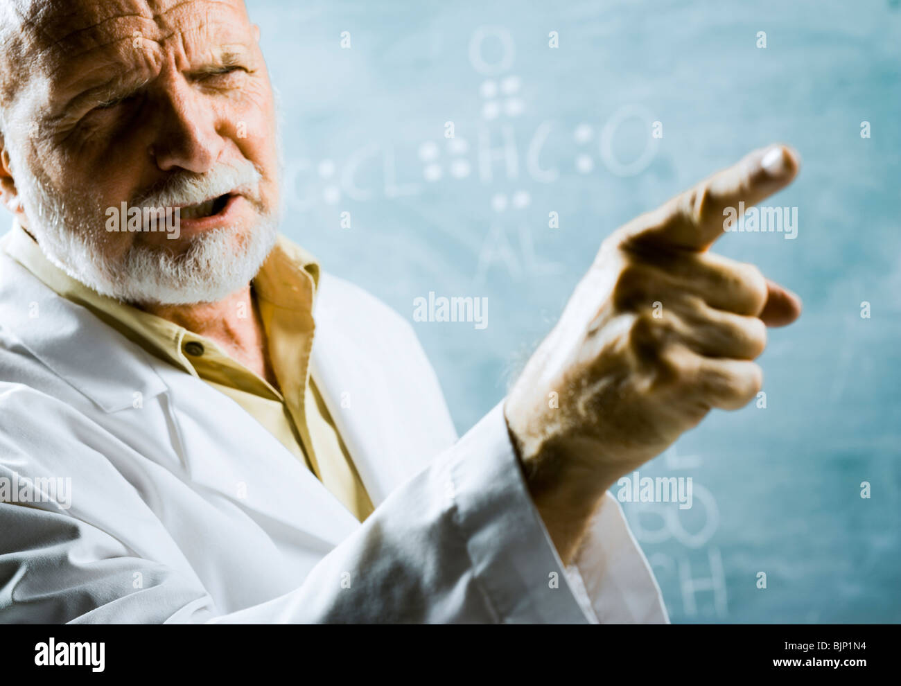 Male science teacher talking Stock Photo - Alamy