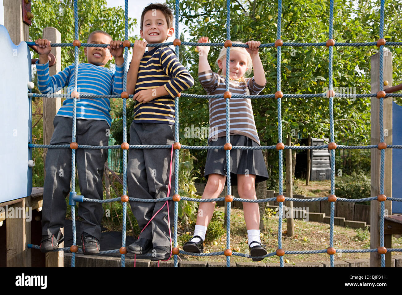 Children on a rope climbing net Stock Photo - Alamy