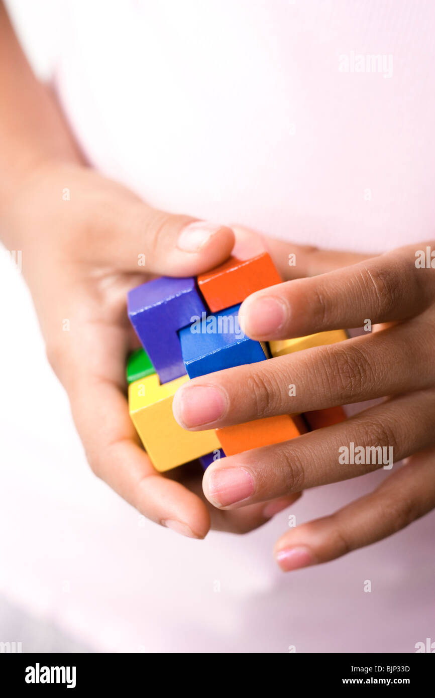 Hands with puzzle Stock Photo - Alamy