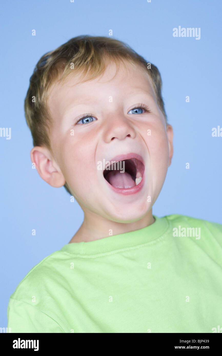 Close up portrait happy boy screaming hi-res stock photography and ...