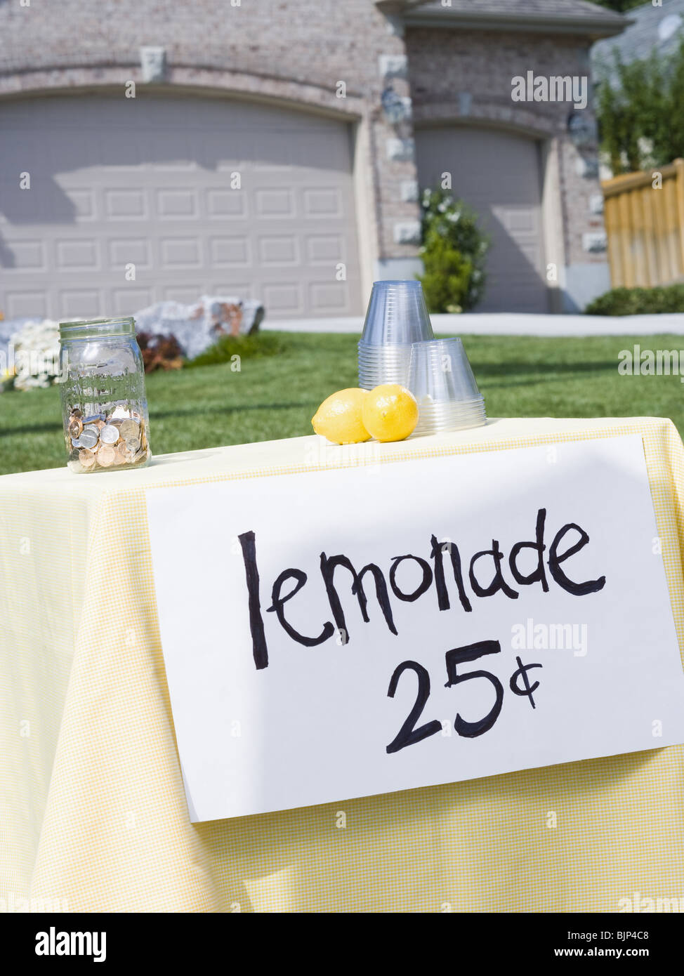 Girl selling lemonade Stock Photo - Alamy