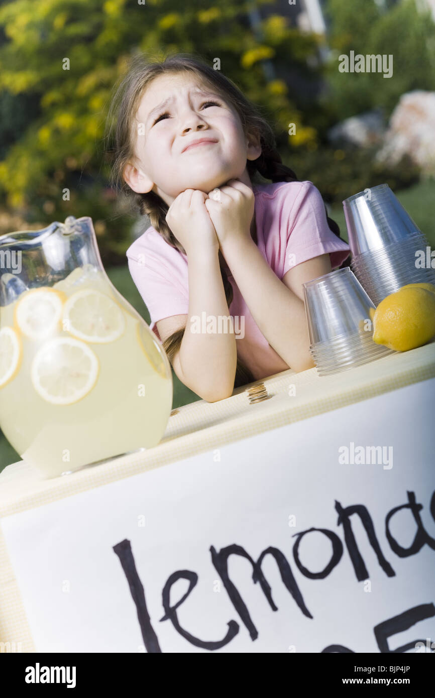 Girl selling lemonade Stock Photo - Alamy
