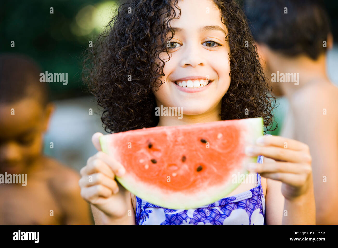 Girl eating watermelon Stock Photo - Alamy