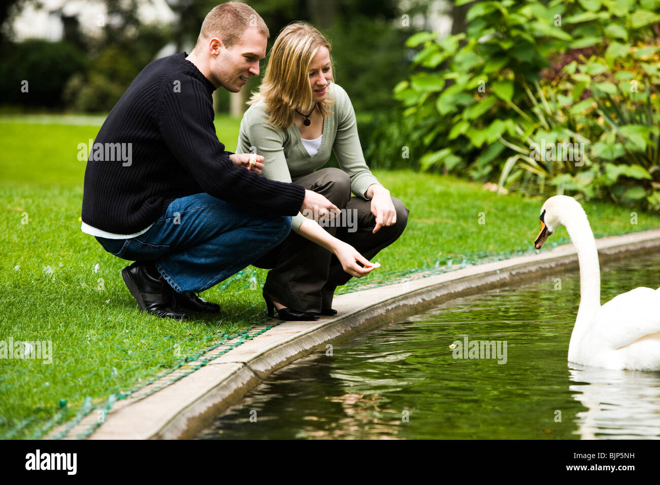 Man woman swan hi-res stock photography and images - Alamy