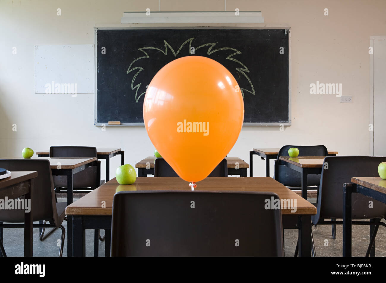 Balloon in classroom Stock Photo - Alamy