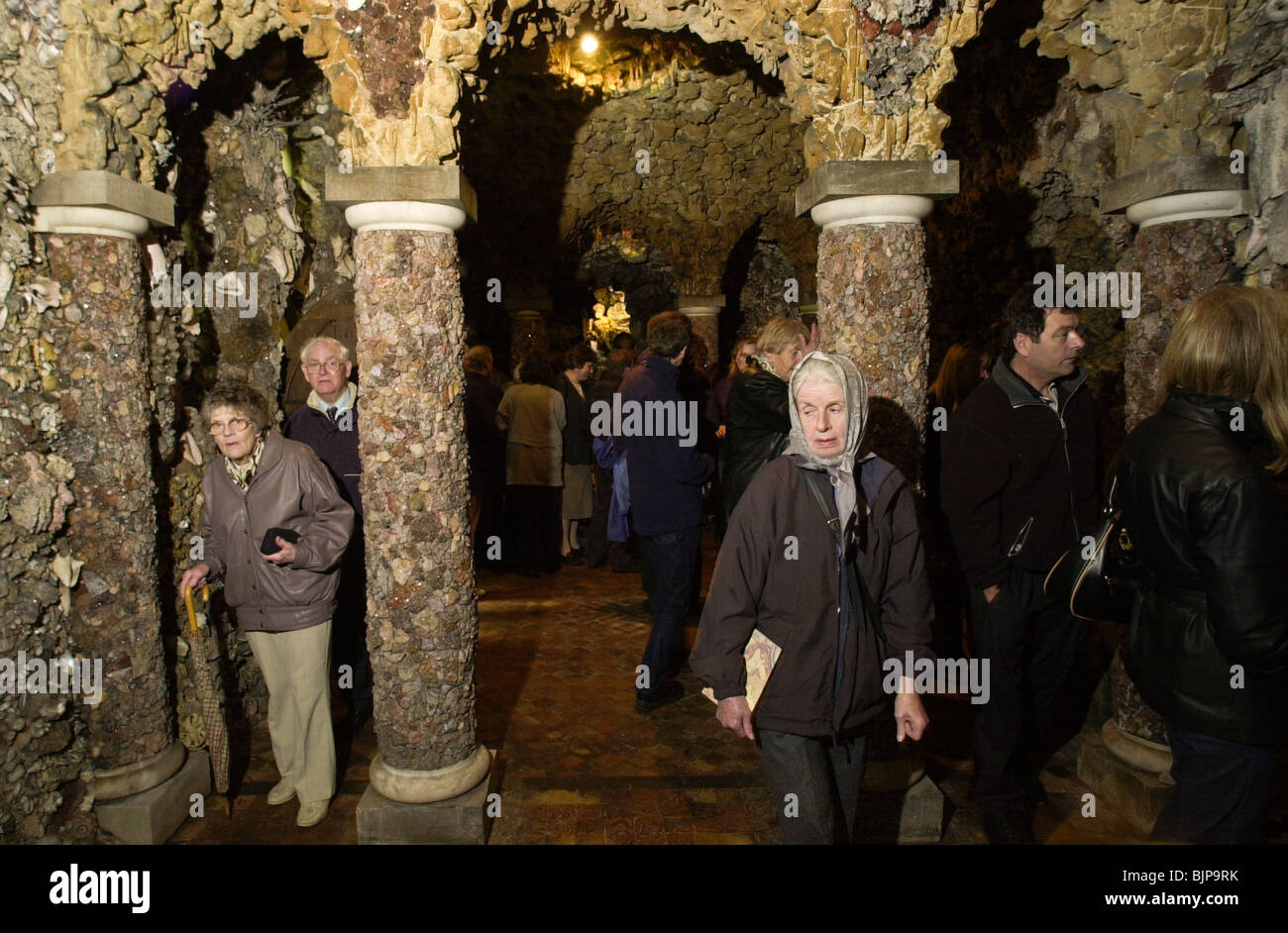 Visitors and students in the underground Shell Grotto folly in Goldney ...