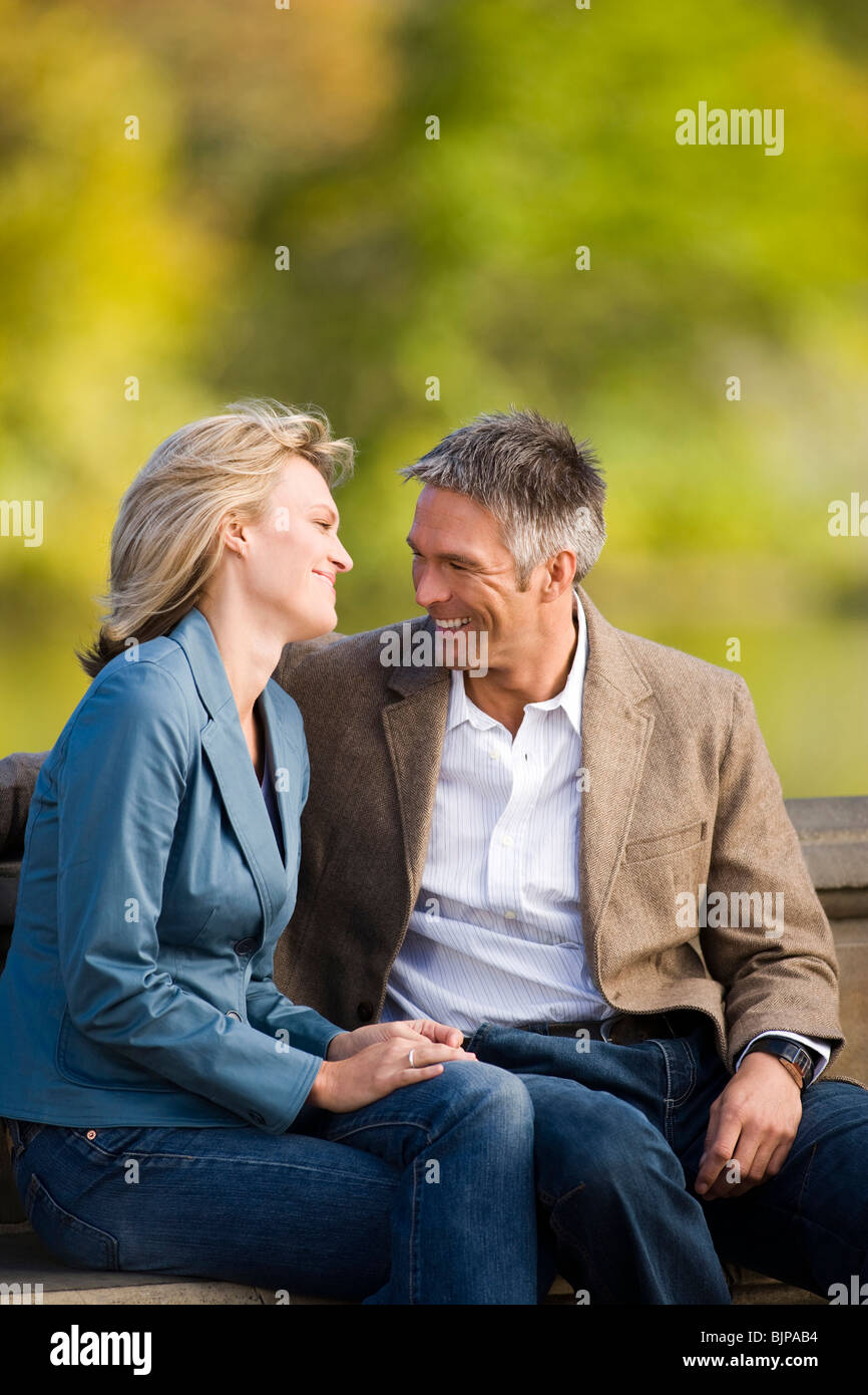 Man and woman smiling Stock Photo - Alamy