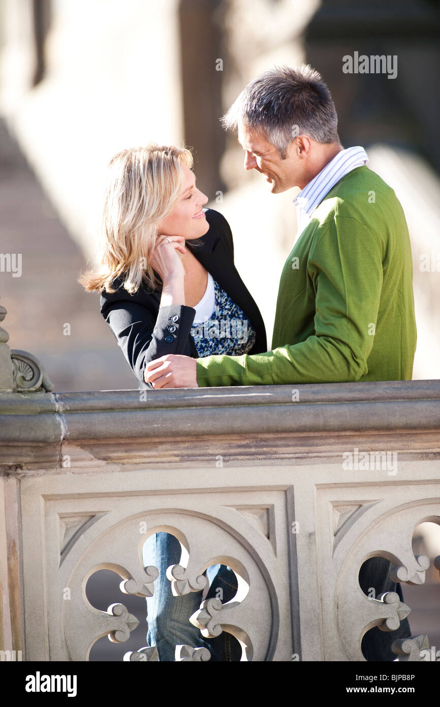 Man and woman smiling Stock Photo - Alamy