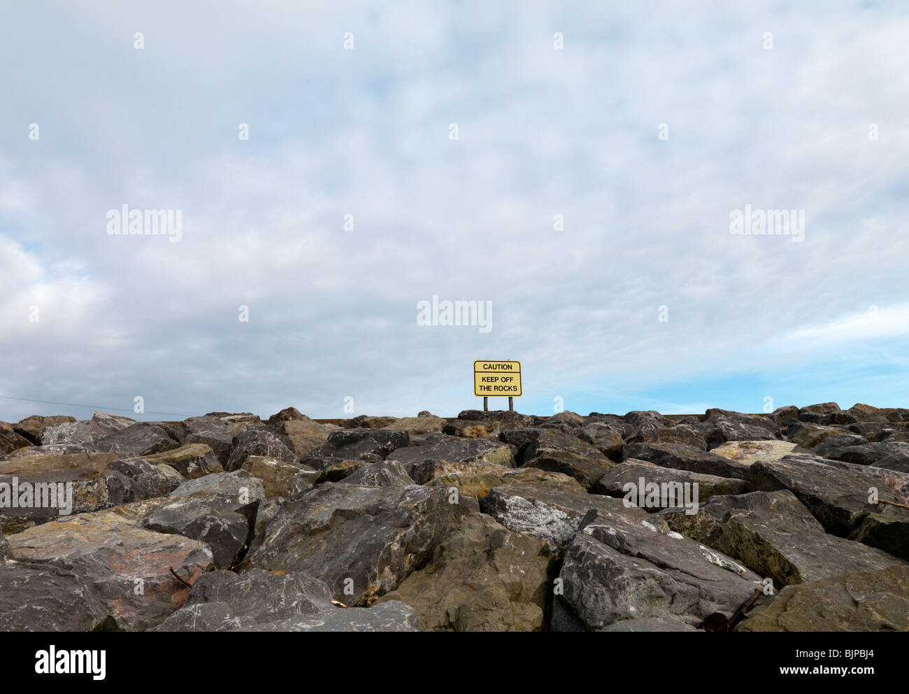 Keep off the rocks sign Stock Photo - Alamy