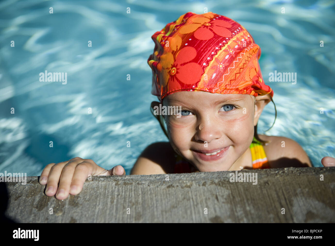 Little girl in a pool Stock Photo - Alamy